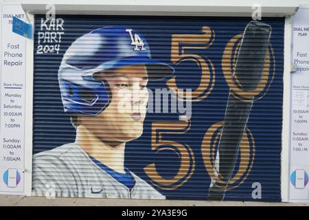 A mural of Los Angeles Dodgers player Shohei Ohtani on the side of the ...