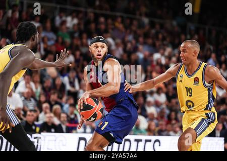 Justin Anderson of FC Barcelona and Louis Olinde of Alba Berlin during ...