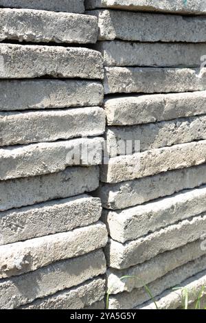 Concrete slabs stacked. Material for construction. Background for ...