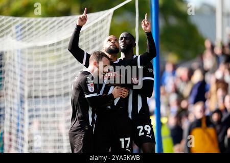 Notts County's Alassana Jatta (second right) is shown a red card by ...