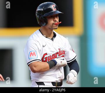 Cleveland Guardians left fielder Steven Kwan cannot make the play on a ...
