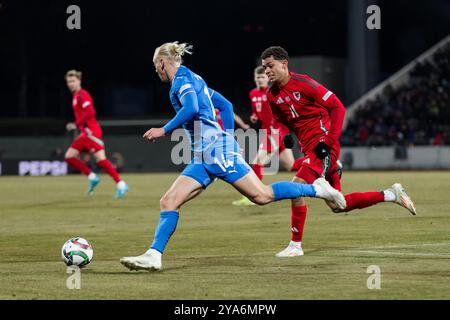 REYKJAVIK, ICELAND - 11 OCTOBER 2024: Wales' Wes Burns and Iceland's ...