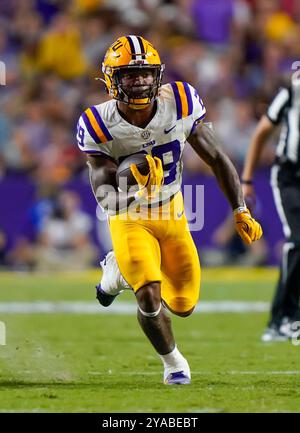 LSU Tigers running back Caden Durham (29) runs past Arkansas Razorbacks ...