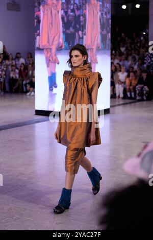 A model walks the runway during Buzina fashion show at ModaLisboa Oasis ...