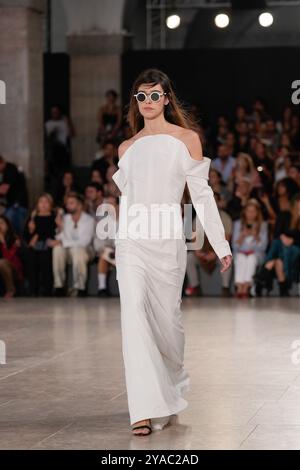 A model walks the runway at the Luís Carvalho Blossom Collection FW 24/ ...
