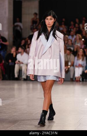 A model walks the runway during Luis Buchinho fashion show at ...