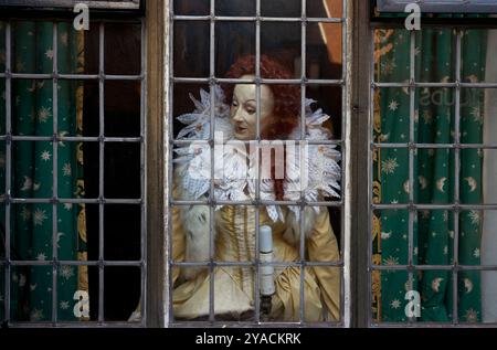 Spooky figure of a woman peering through the window at Tudor World ...