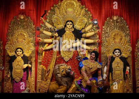 Idol of Goddess Devi Saraswati at a decorated puja pandal in Kolkata ...