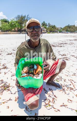 Local man selling sea shells on Diani Beach on the Indian Ocean, , Galu ...