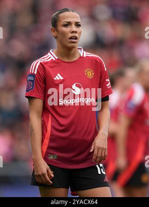 Manchester United's Celin Bizet Ildhusoy (right) has a shot at goal ...