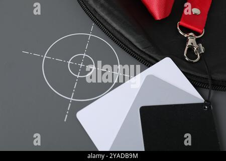 White balance calibration cards and case as background, closeup Stock ...