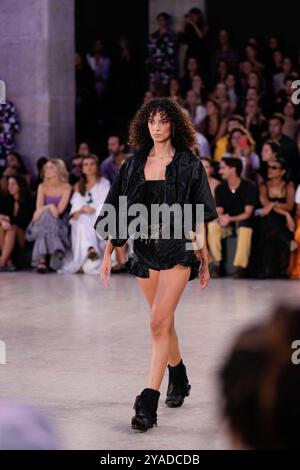 A model walks the runway during Buzina fashion show at ModaLisboa Oasis ...