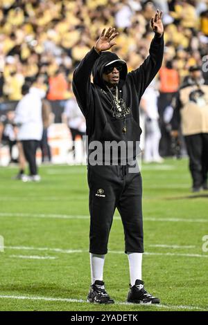Colorado head coach Deion Sanders looks on as players takes part in ...