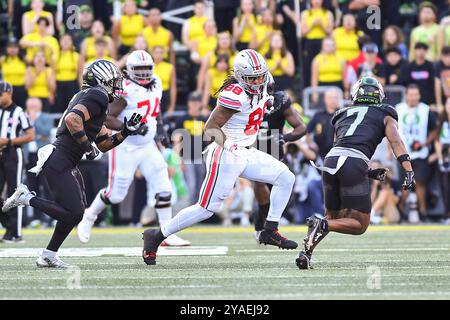 Ohio State tight end Gee Scott Jr. (88) runs the ball against Oregon ...