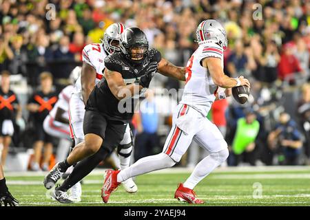 Oregon defensive lineman Derrick Harmon runs a drill at the NFL ...