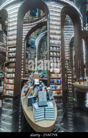 CHENGDU, CHINA - OCTOBER 13, 2024 - Visitors read books at Zhongshuge ...