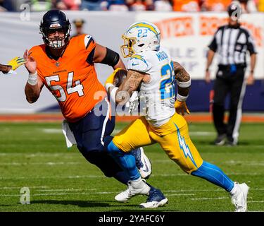 Denver Broncos center Alex Forsyth (54) takes part in drills during an ...