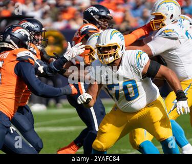 Los Angeles Chargers offensive tackle Savion Washington, left ...