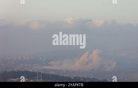 Smoke rises after Israeli airstrikes in Gaza in Gaza City, Tuesday, May ...