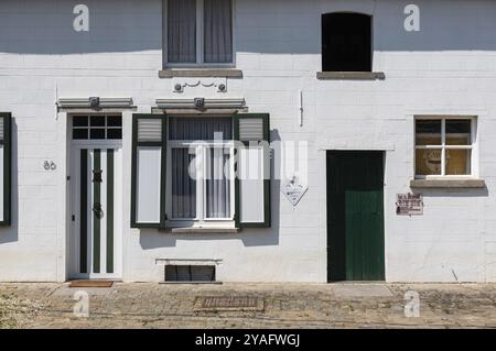 Typical Flemish rural houses in the countryside of Damme, a picturesque ...