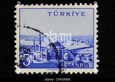 ISTANBUL, TURKEY - DECEMBER 25, 2020: Switzerland stamp shows Postilion ...