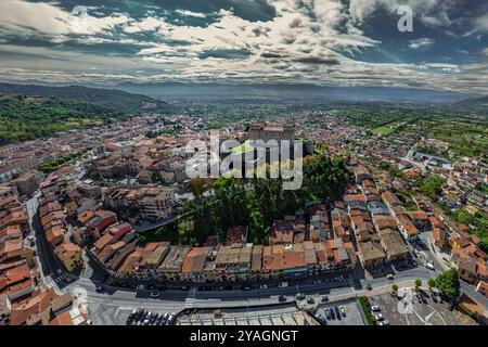 An aerial panoramic view of L'Aquila city in Italy surrounded by Monte ...