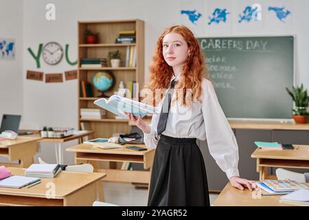 Red-haired girl student Stock Photo - Alamy