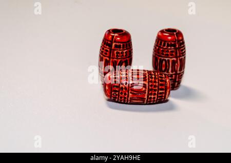 Barrel shaped red toggle buttons on a white background Stock Photo - Alamy