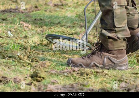 The military searches for mines using a metal detector Stock Photo - Alamy