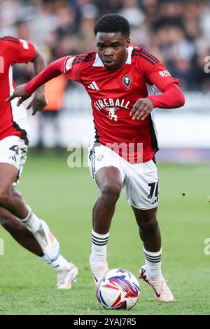 Salford City’s Kelly Nmai and Grimsby Town’s Lewis Cass during the Sky ...