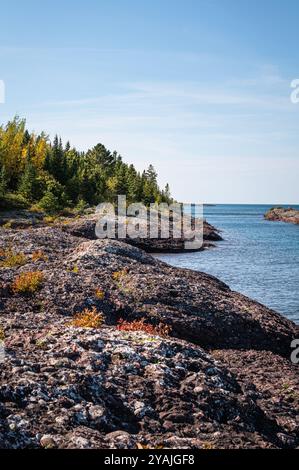 Rocky coastline of Lake Superior in Big Bay State Park in La Pointe on ...