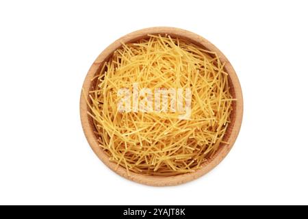 Uncooked vermicelli pasta in ceramic bowl on white wooden background ...