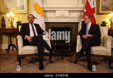 Cyprus' President Nikos Christodoulides, right, welcomes the European ...