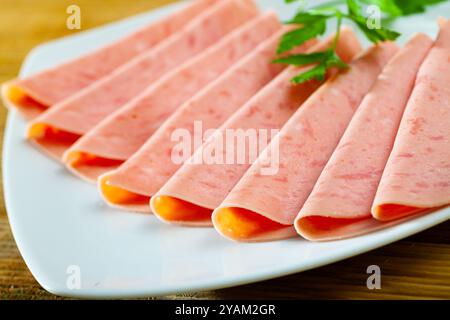 Slicing chopped ham from pork meat, no people Stock Photo - Alamy