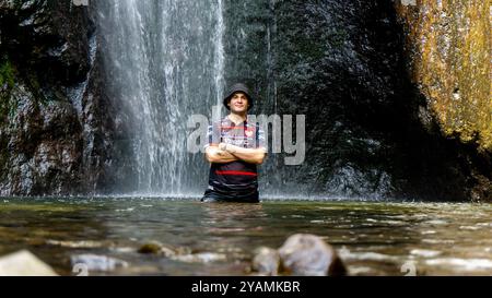 People vacation at dolo waterfall. Dolo is one of the waterfalls in ...