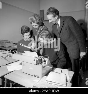Learning to type in the 1960s. A classroom of students sitting at ...