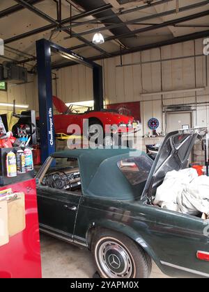 Small automobile service shop specializing in foreign sports and ...