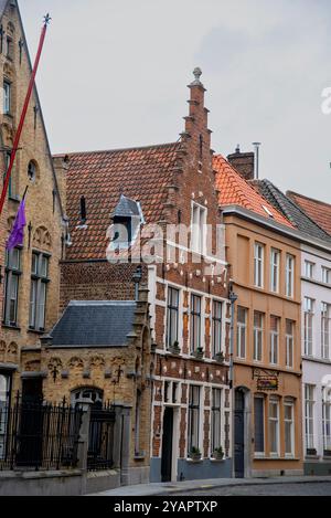 Brick Gothic tracery window pediments in medieval Bruges, Belgium Stock ...