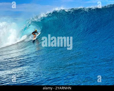 A giant wave at Teahupo'o, Tahiti, the venue for the 2024 surfing event ...