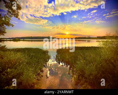 Sunset at Pony Express Lake with windmills, Missouri Stock Photo - Alamy