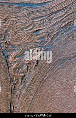 This image is from the floor of the Hellas Basin, a 1,400-mile wide ...