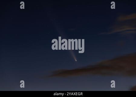 Comet C2023 A3 (Tsuchinshan-ATLAS) soars across the evening sky over ...