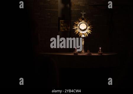 Adoration of the Blessed Sacrament at night in a community chapel in ...