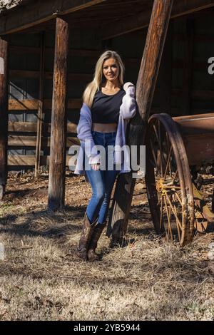 A Lovely Blonde Model Poses Outdoor While Enjoying The Fall Weather ...