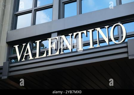 Valentino store sign company brand logo Stock Photo - Alamy