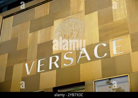 Versace store sign company brand logo Stock Photo - Alamy