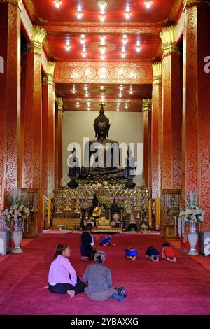 Phra Ong Teu, the large bronze Buddha statue accompanied by tow ...