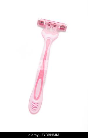 Pink disposable woman razor on white background close up. Hair removing ...