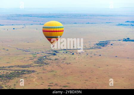 Tourist ariel balloon in flight against a blue sky, Marai Mara, Kenya ...