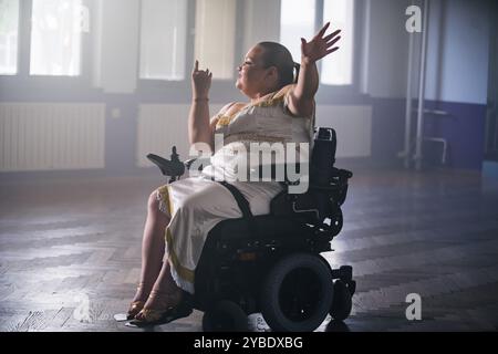 Woman with disability training for a competition, performing a solo ...